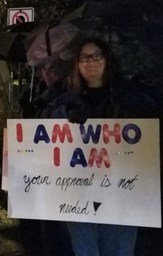 i am who i am trans sign - Feminist Current