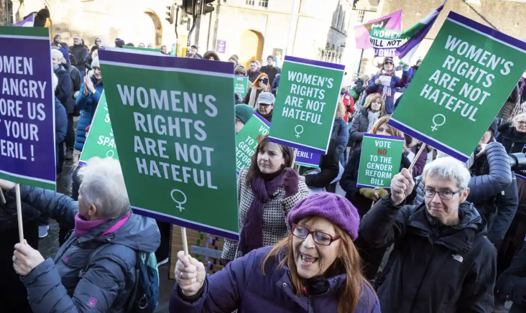 For Women Scotland activists rally outside the Scottish parliament to ...